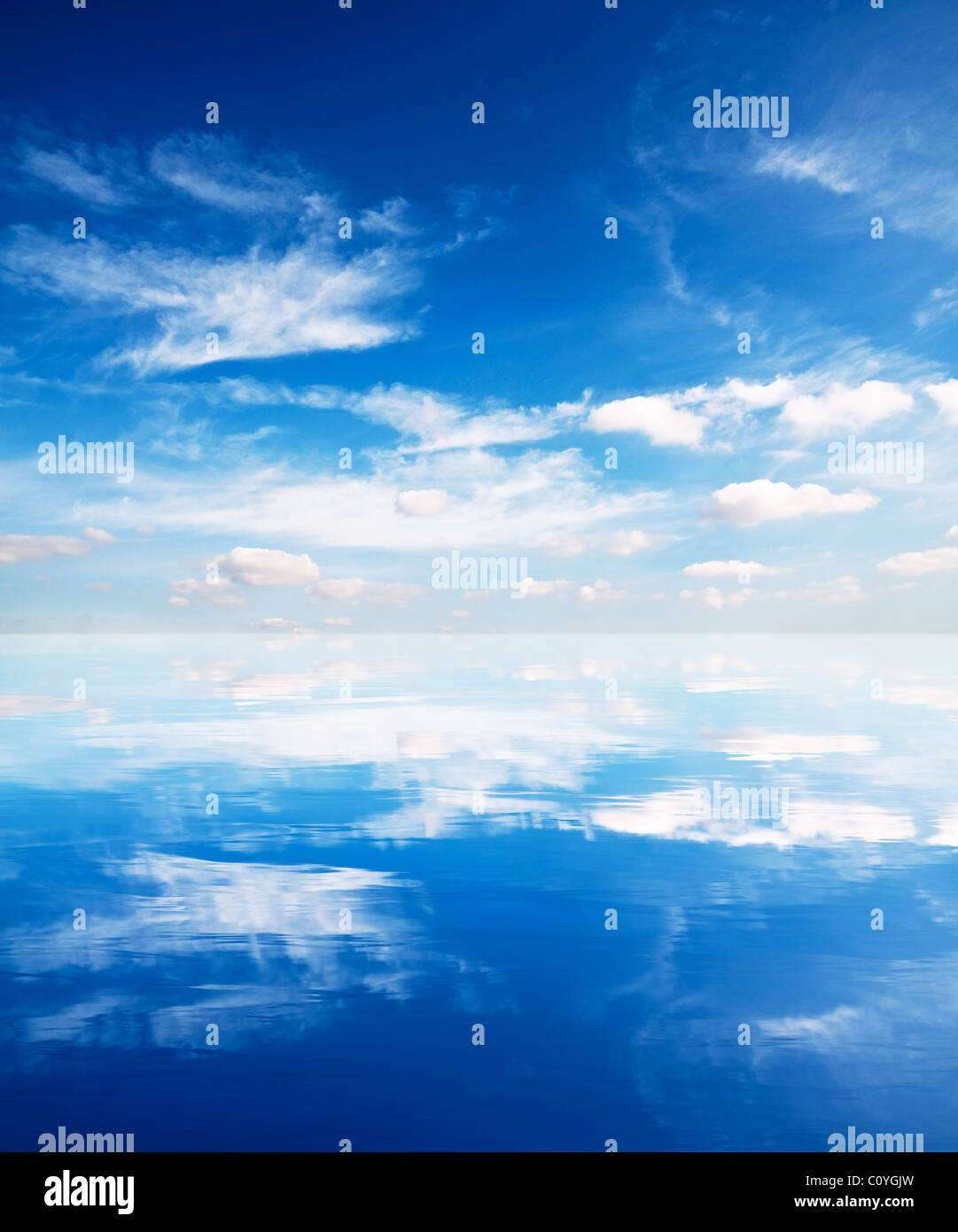 Mirror image of blue sky and clouds hi-res stock photography and images ...