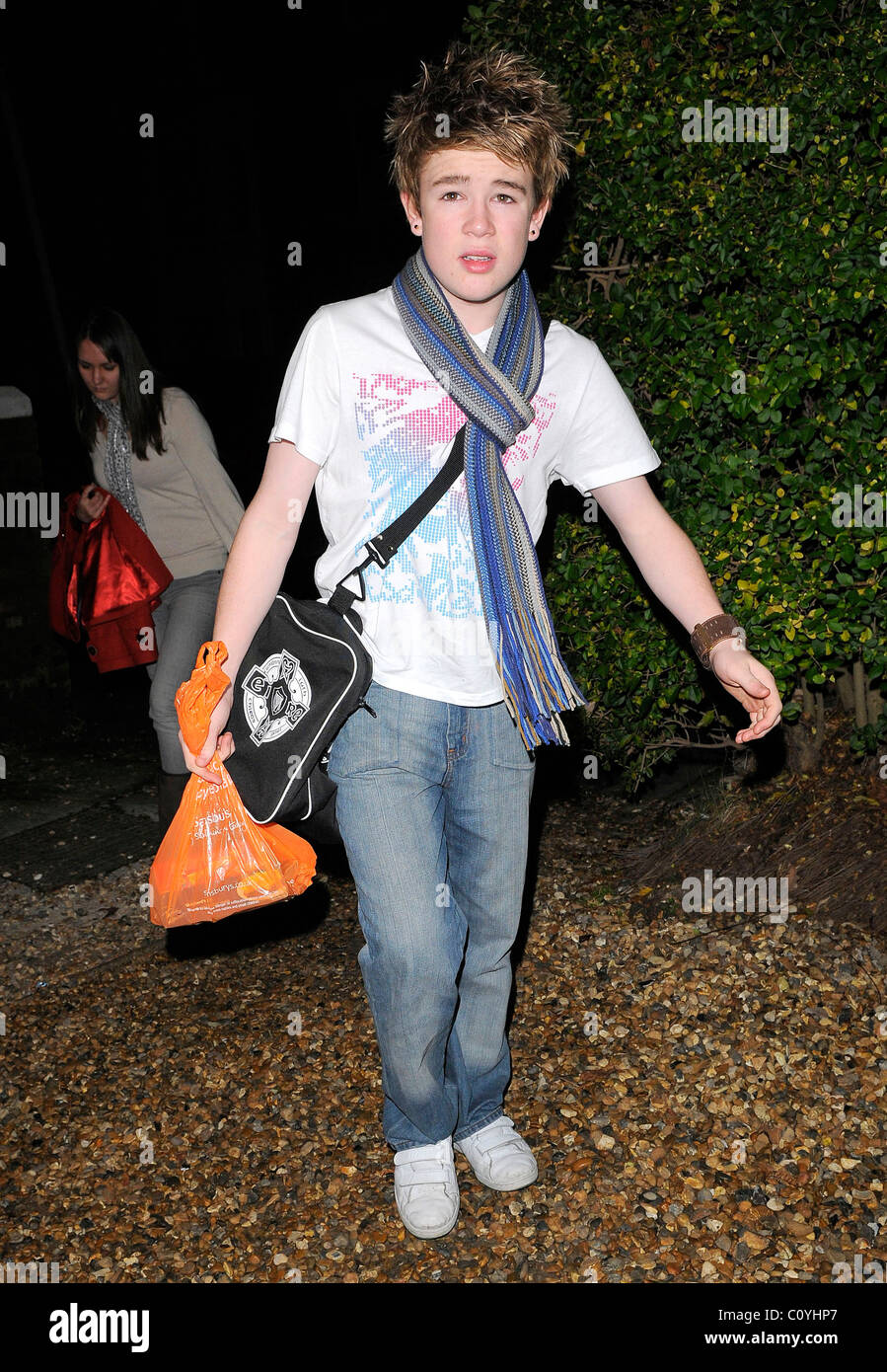 Eoghan Quigg arriving back at The X Factor secret hideaway, holding ...
