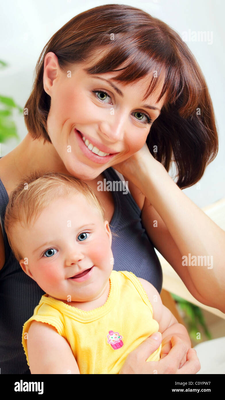 Portrait of a smiling mother & baby, happy family Stock Photo - Alamy