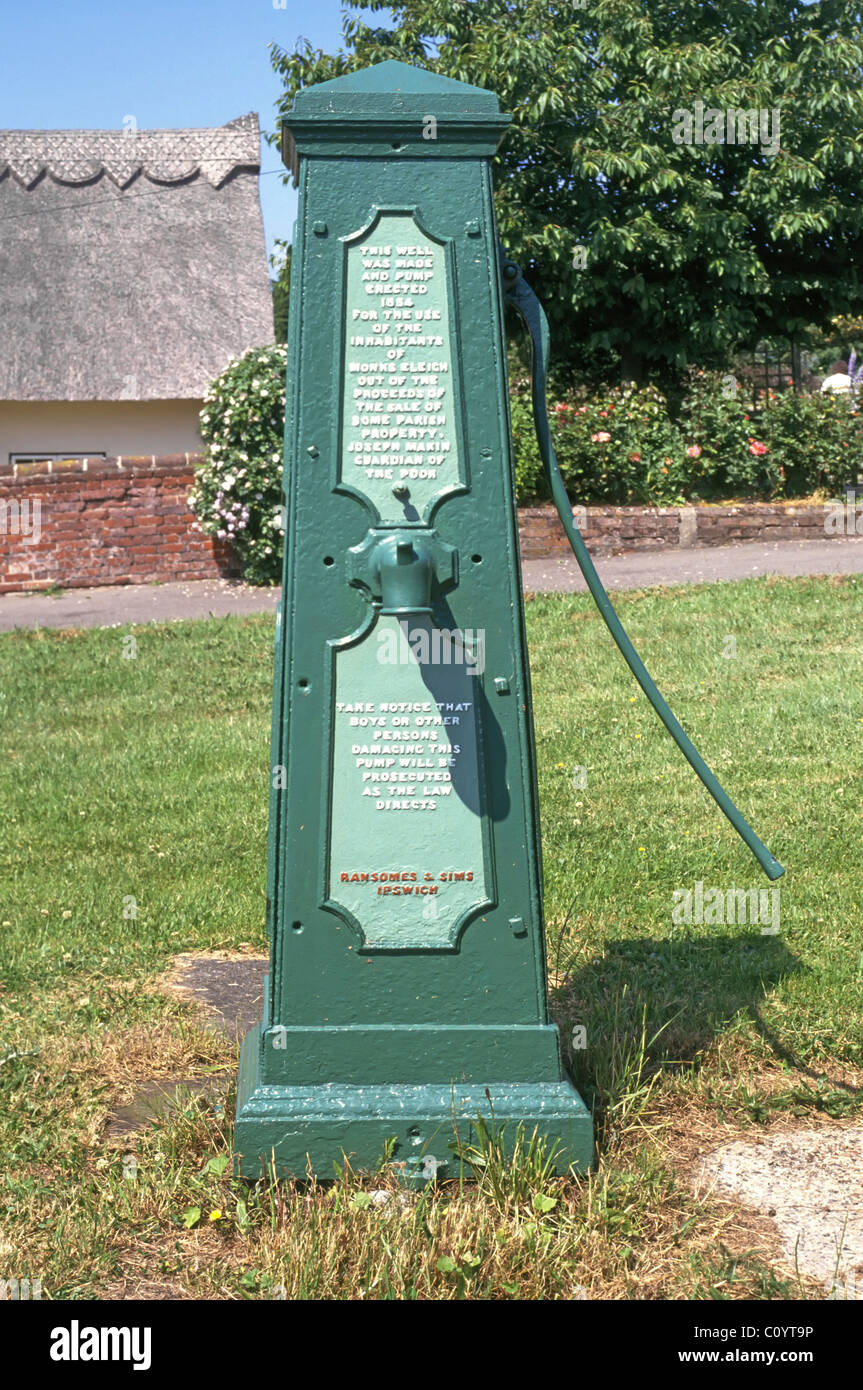 Historical preserved hand water pump on the village green at Monks ...