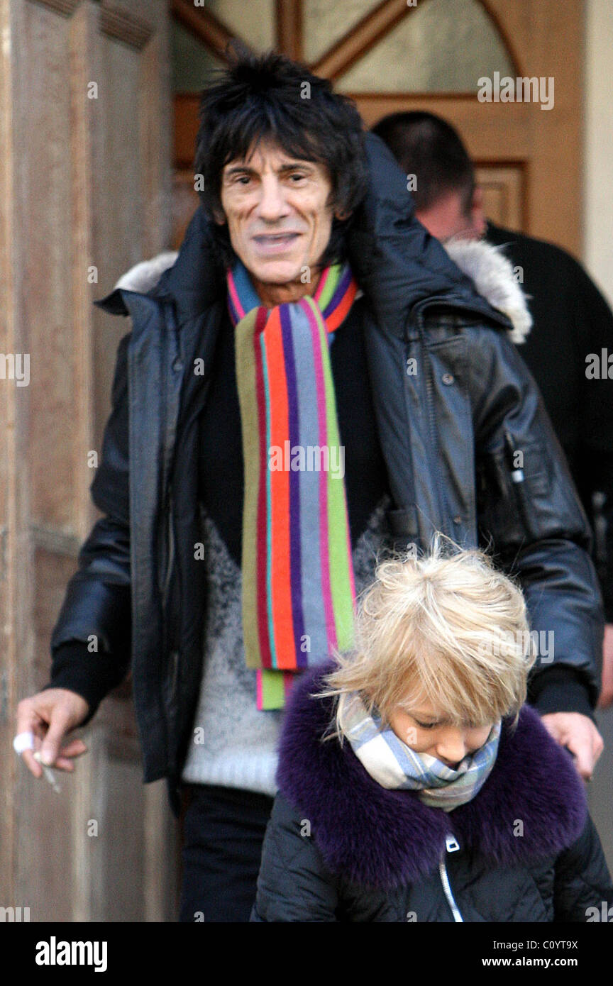 Ekaterina Ivanova and Ronnie Wood take their dog to visit a pet shop ...