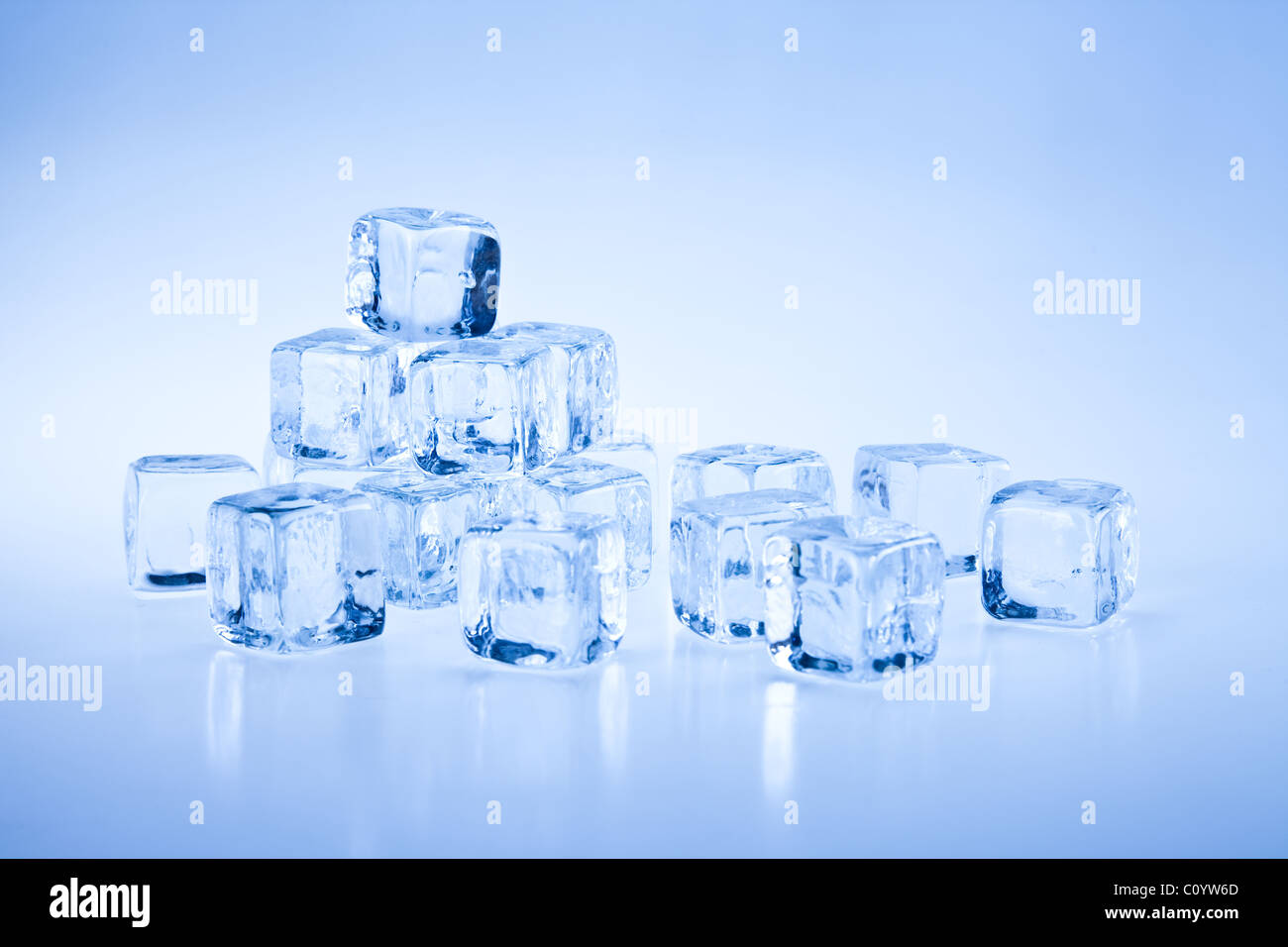 Ice cubes over background Stock Photo - Alamy