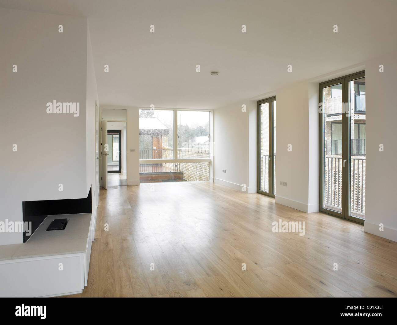 Interior shot of empty open plan lounge area Stock Photo - Alamy