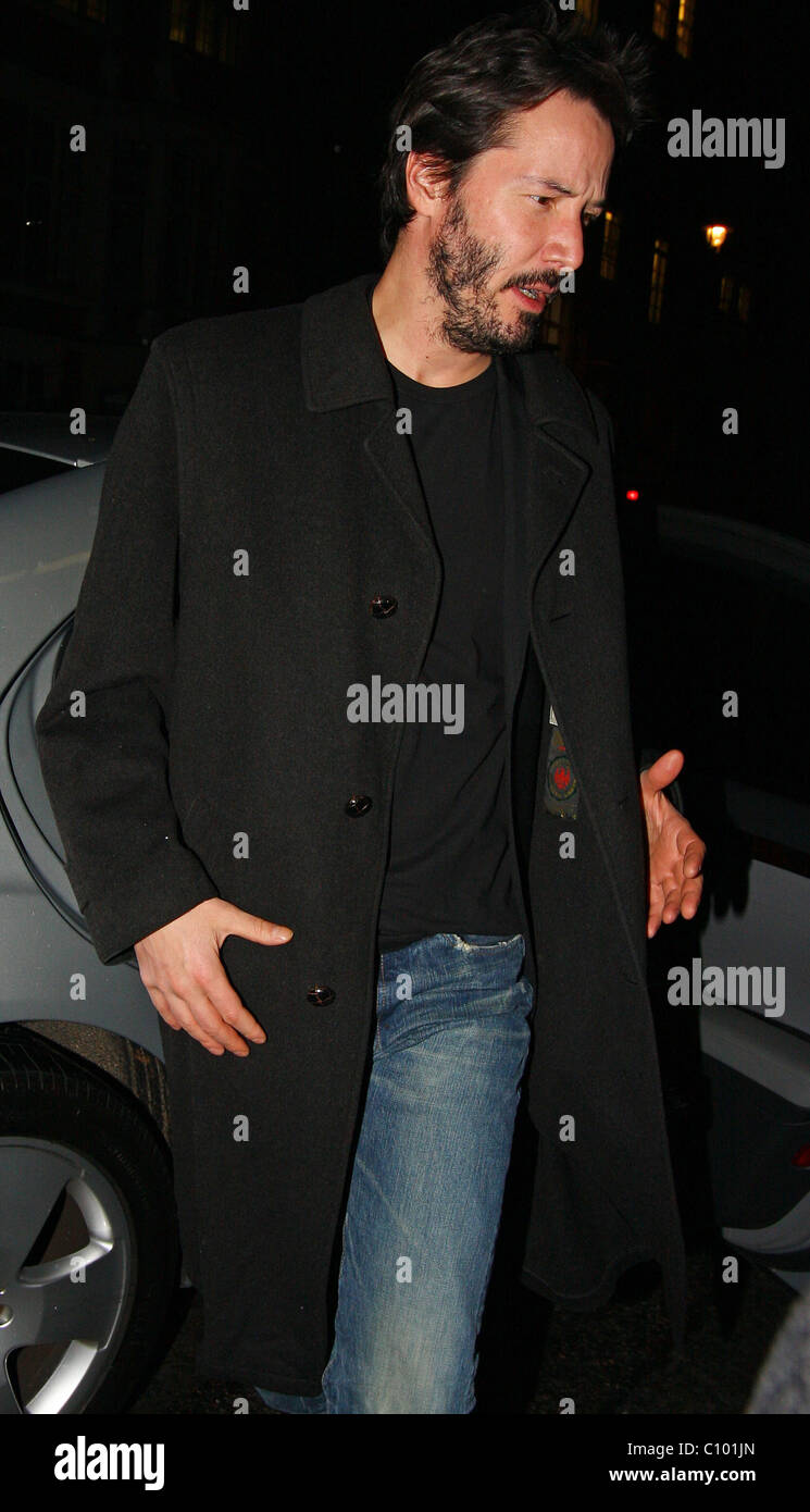 Keanu Reeves arriving at his hotel wearing old brown shoes London ...