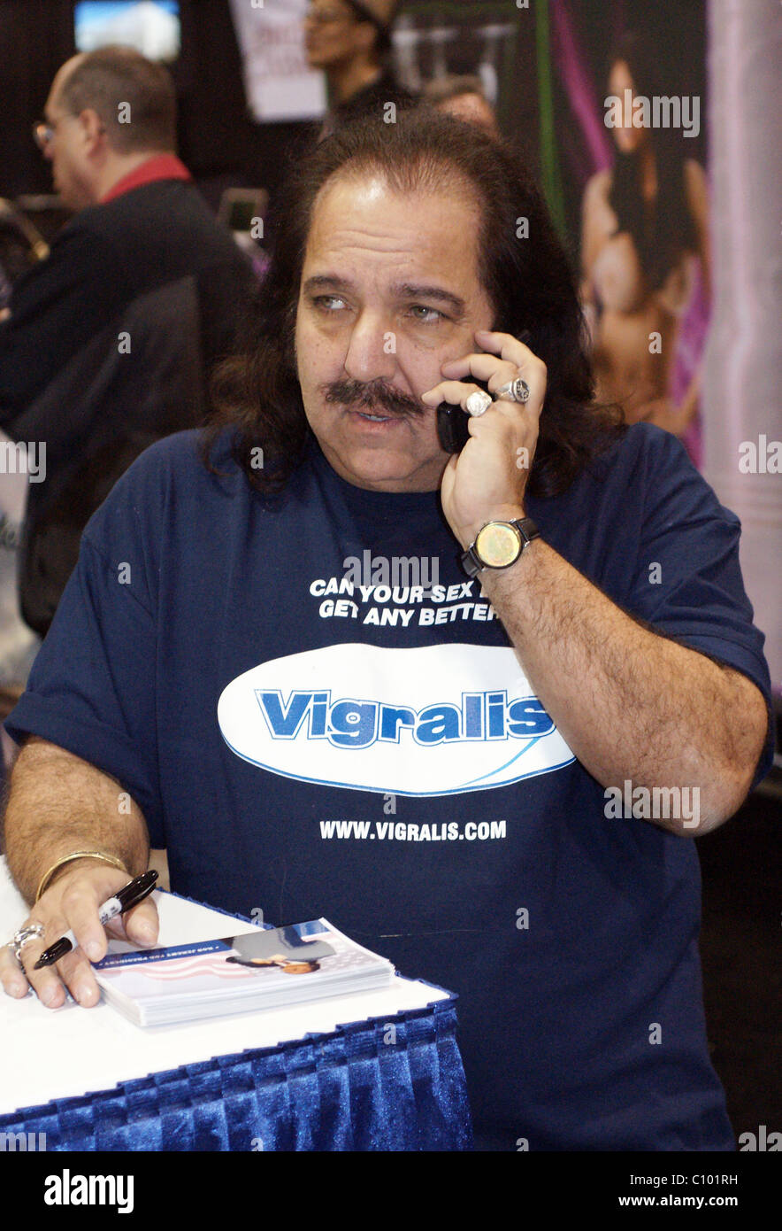 Ron Jeremy signs autographs at the Paradise Visuals booth at the Adult ...