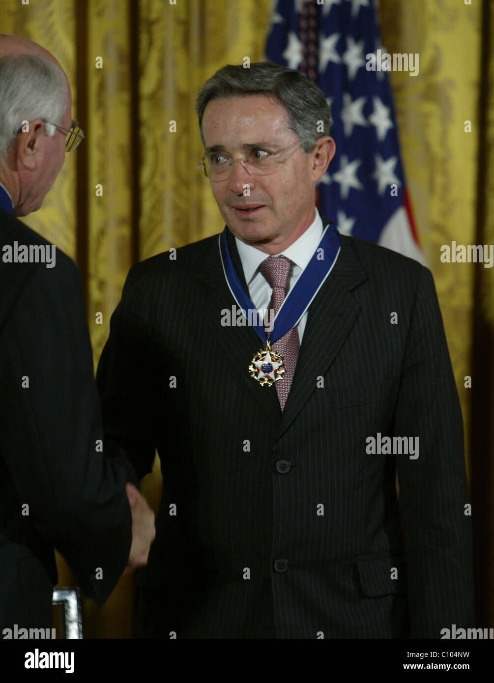 President George W. Bush presents the Presidential Medal of Freedom to ...