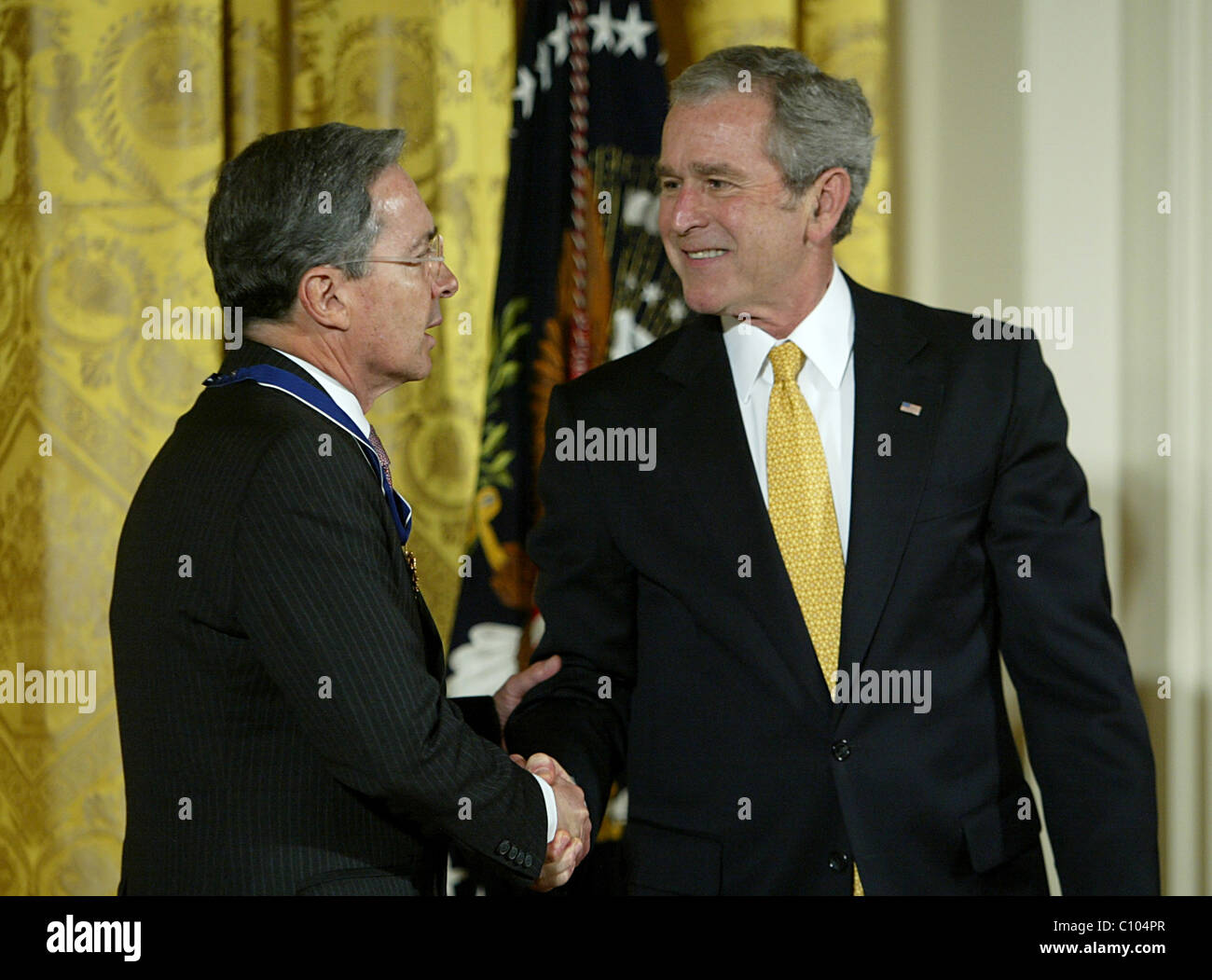 President George W. Bush presents the Presidential Medal of Freedom to ...