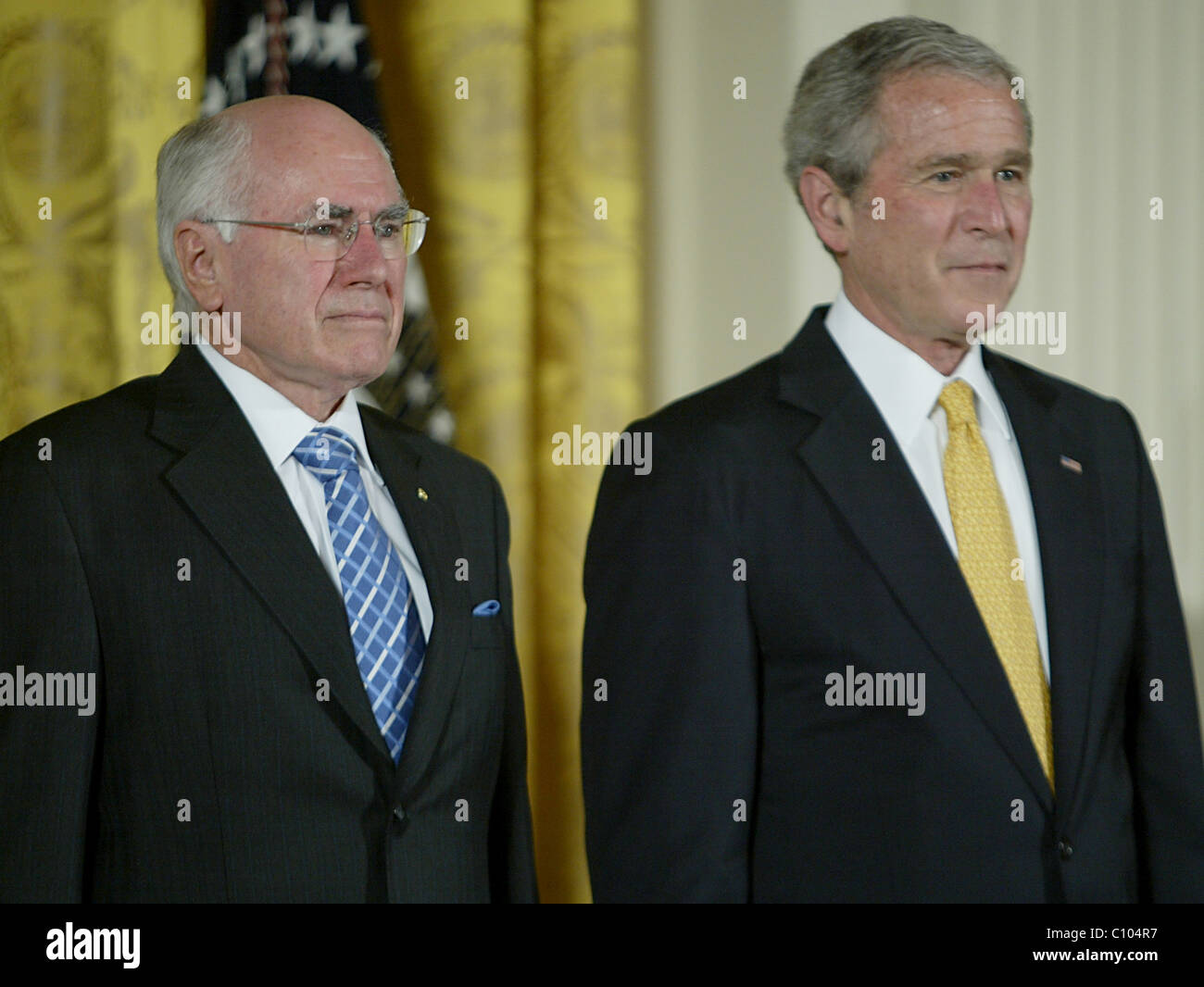 President George W. Bush presents former Australian Prime Minister John ...