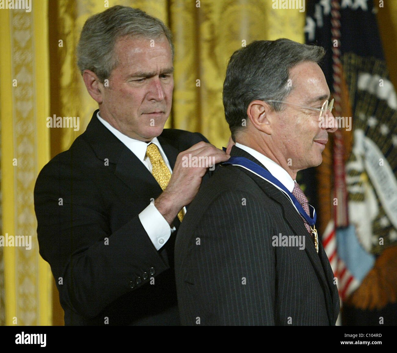 President George W. Bush presents the Presidential Medal of Freedom to ...