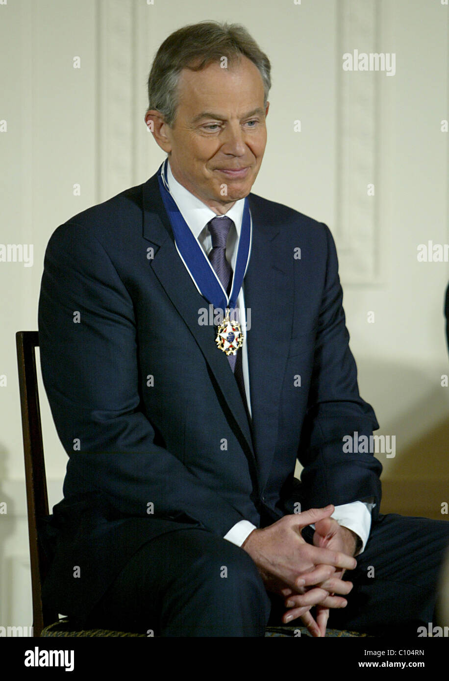 President George W. Bush presents the Medal of Freedom to former ...