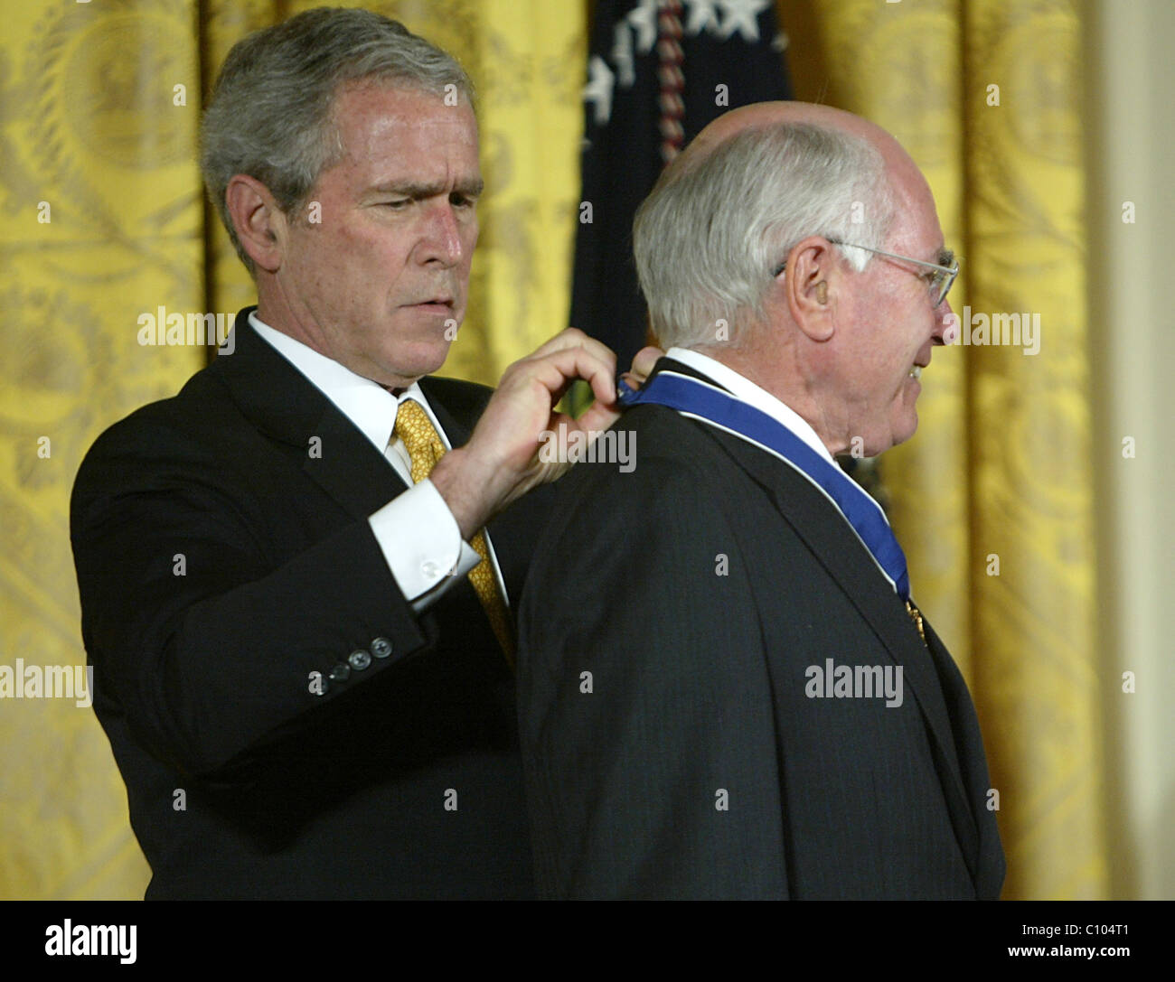 President George W. Bush presents former Australian Prime Minister John ...