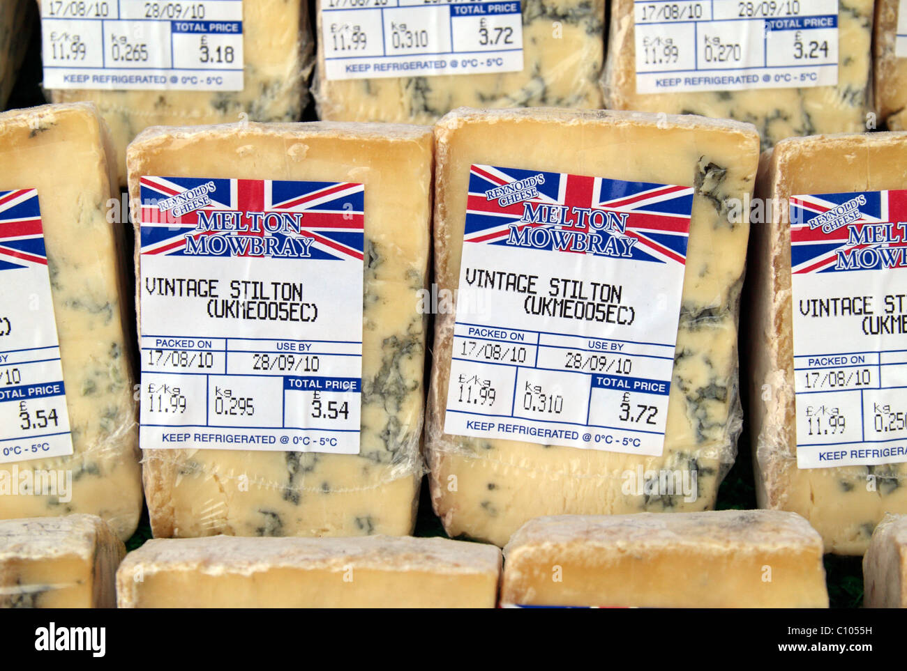 Vintage blue stilton cheese on display at the street market in Melton ...