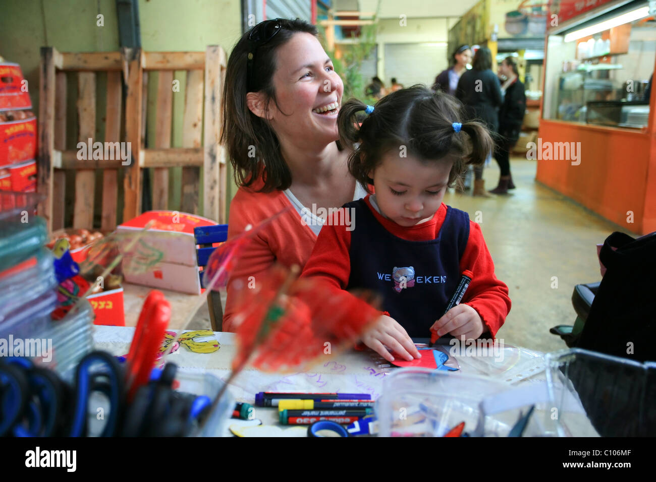 Young toddler doing handcraft Stock Photo - Alamy