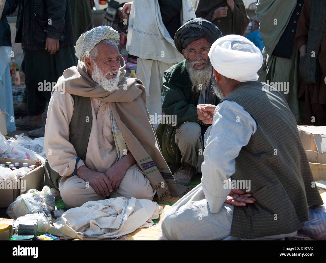 Men gather to chat in Helmand Afghanistan Stock Photo - Alamy