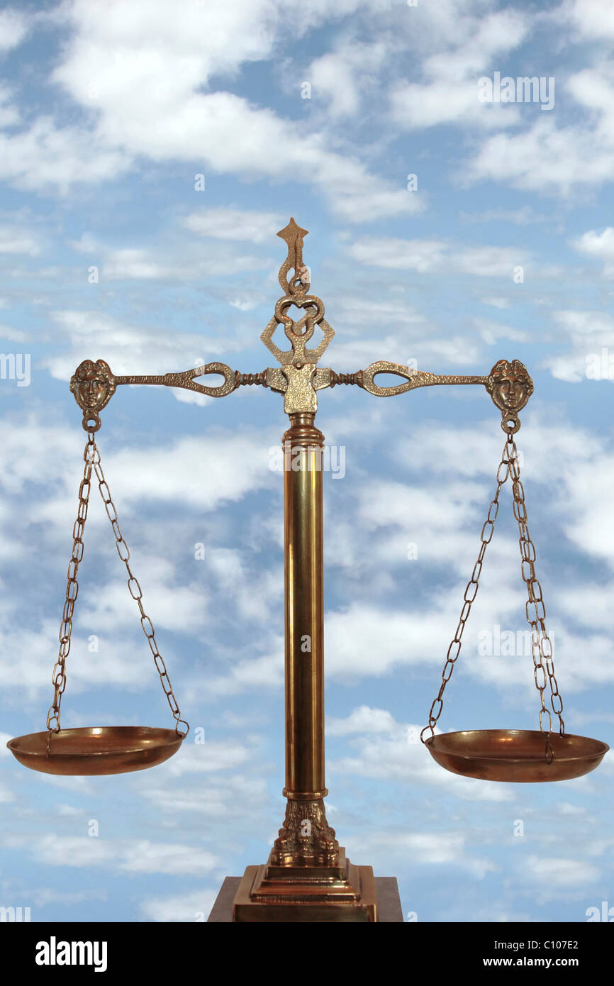 an antique scales against a cloudy background with clipping path Stock ...