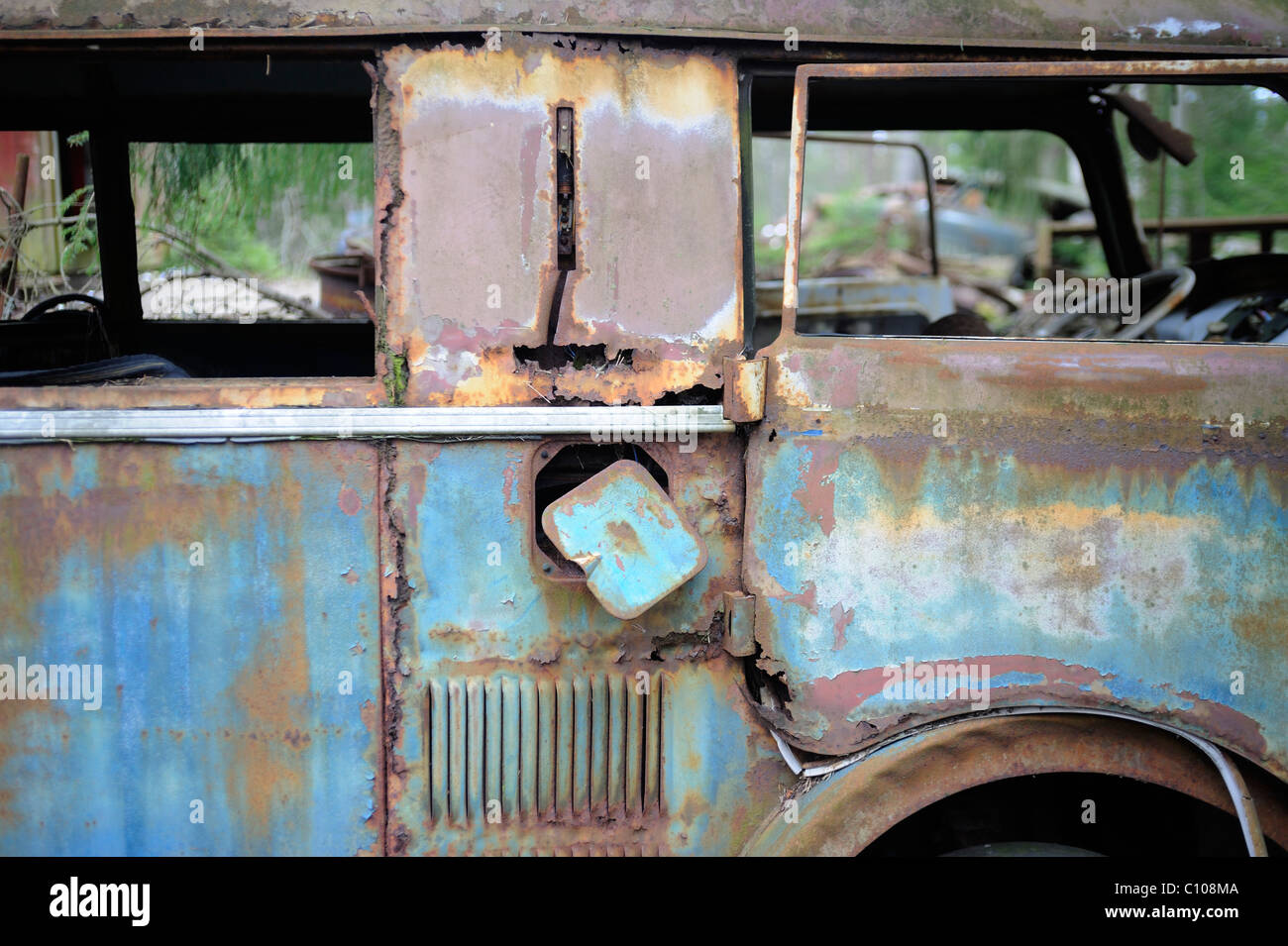 Old dilapidated cars are left in a swedish bog to rust and break down ...