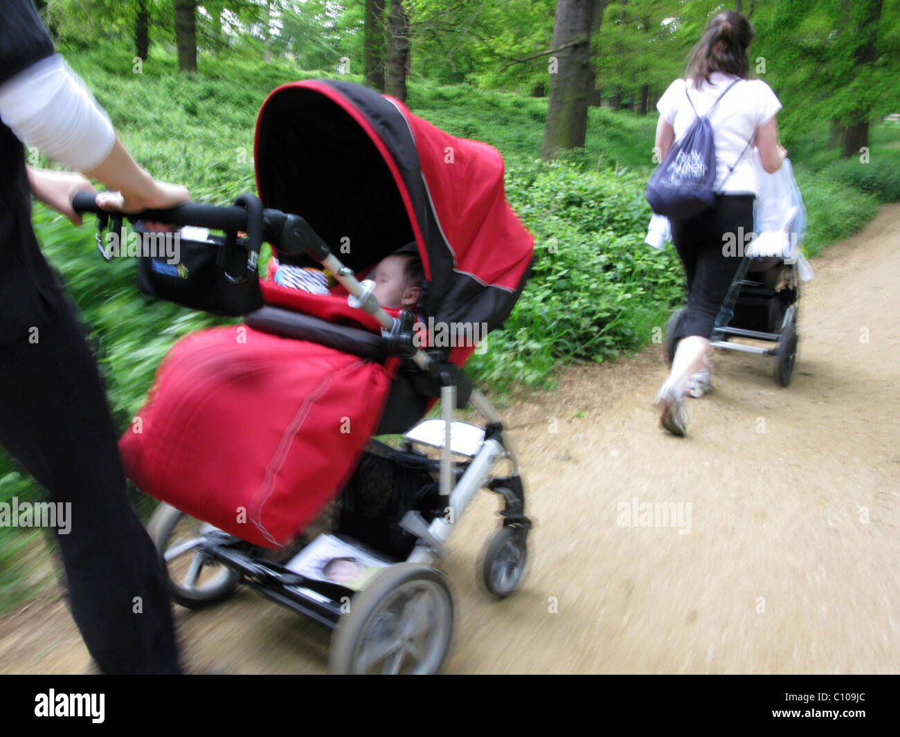 Mothers pushing buggy's during an outdoor exercise class Stock Photo ...