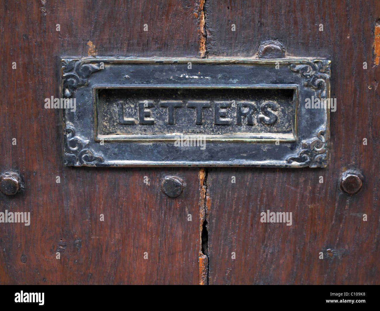Wrought iron ancient letterbox Stock Photo - Alamy
