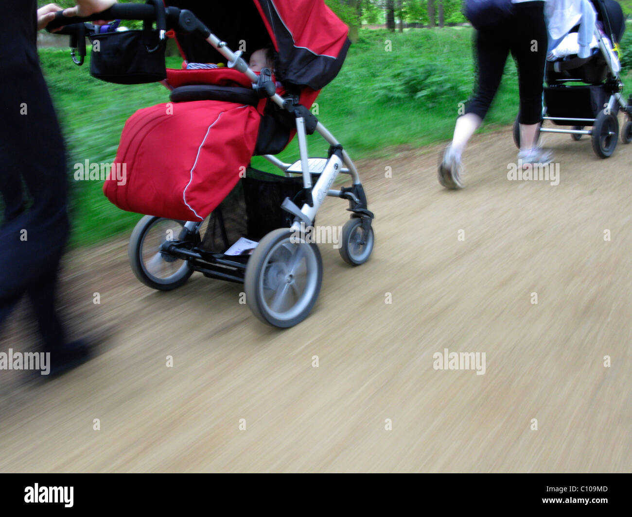 Mothers pushing buggy's during an outdoor exercise class Stock Photo ...