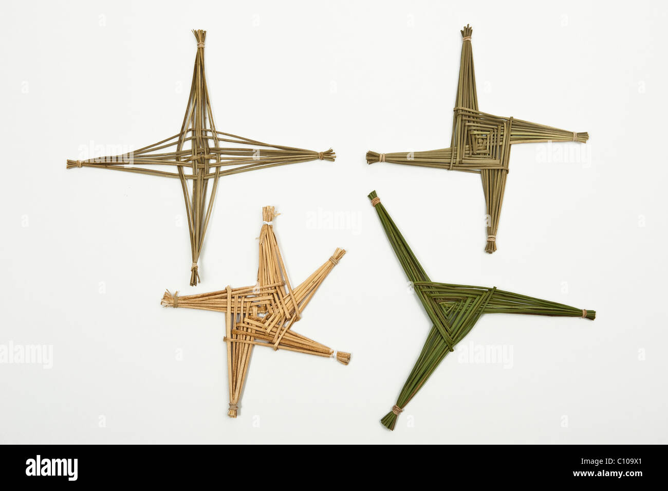 Versions of St Brigid's cross made of woven rushes, traditionally hung ...