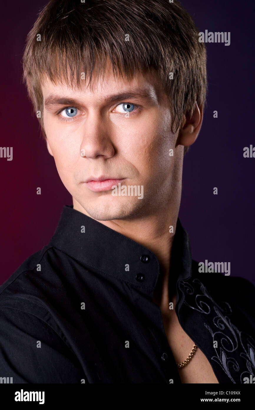 Portrait of handsome Young man staring at you Stock Photo - Alamy