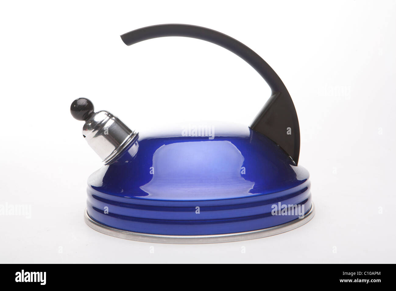 A photograph of a blue metallic stove kettle Stock Photo - Alamy