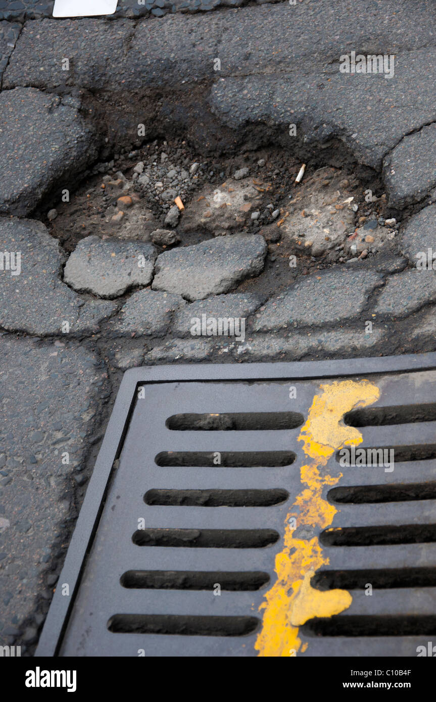 Hole in the road hi-res stock photography and images - Alamy