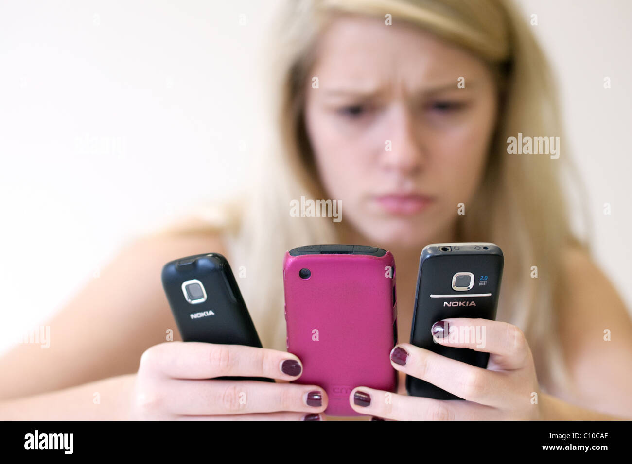 Many phones hi-res stock photography and images - Alamy