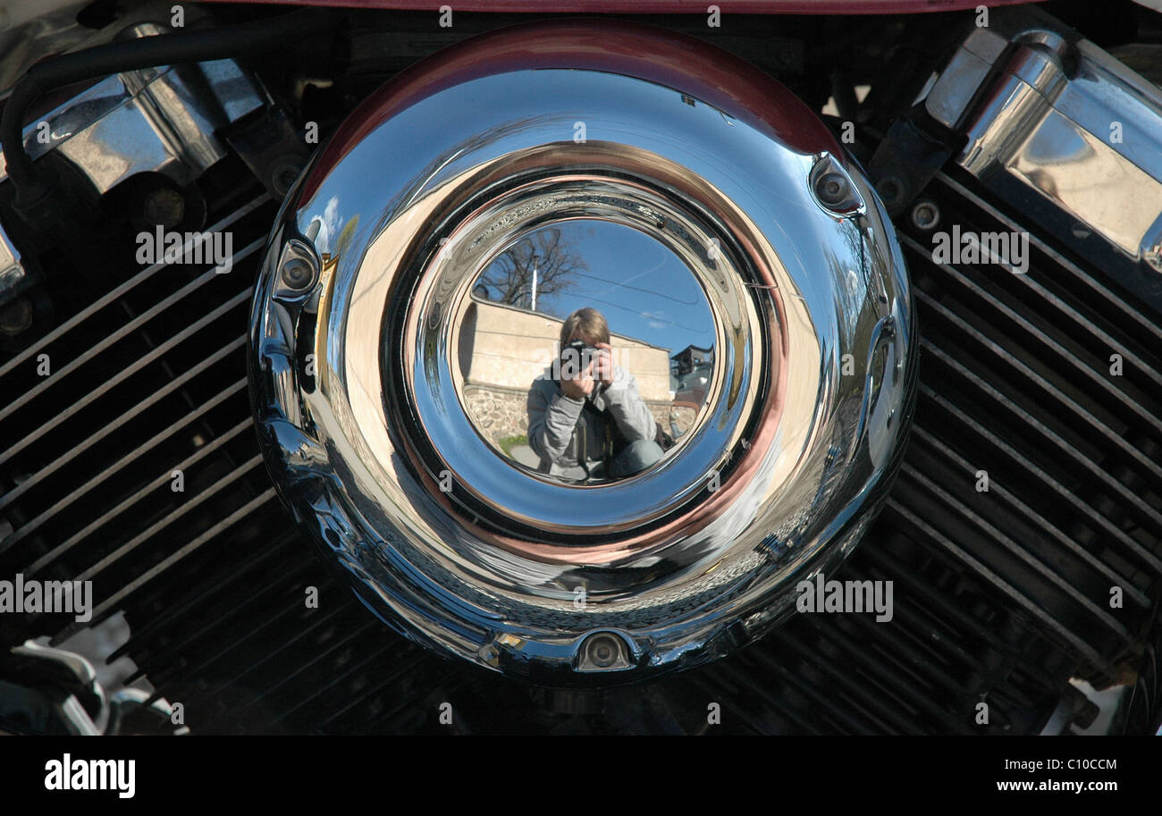 photographer reflecting from motorcycle cylinder Stock Photo - Alamy