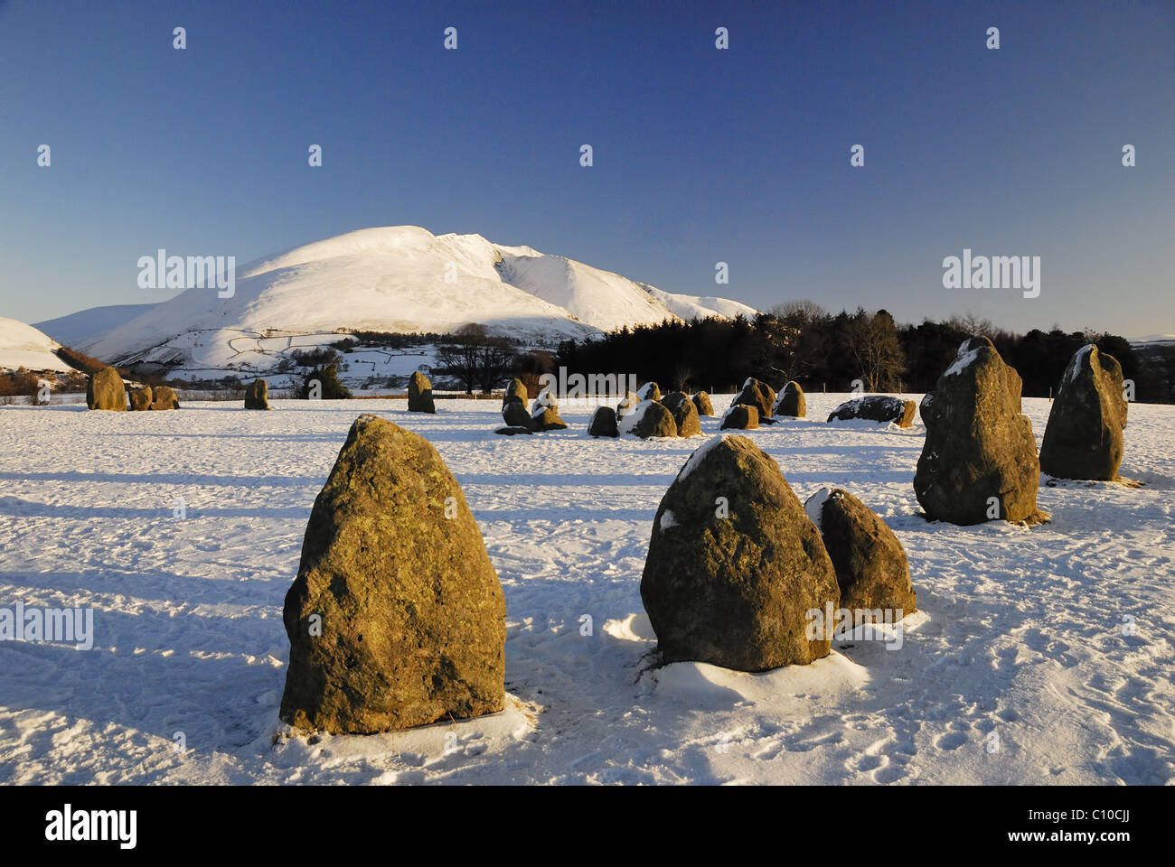 Snow covered Blencathra and Castlerigg Stone Circle in winter in the ...
