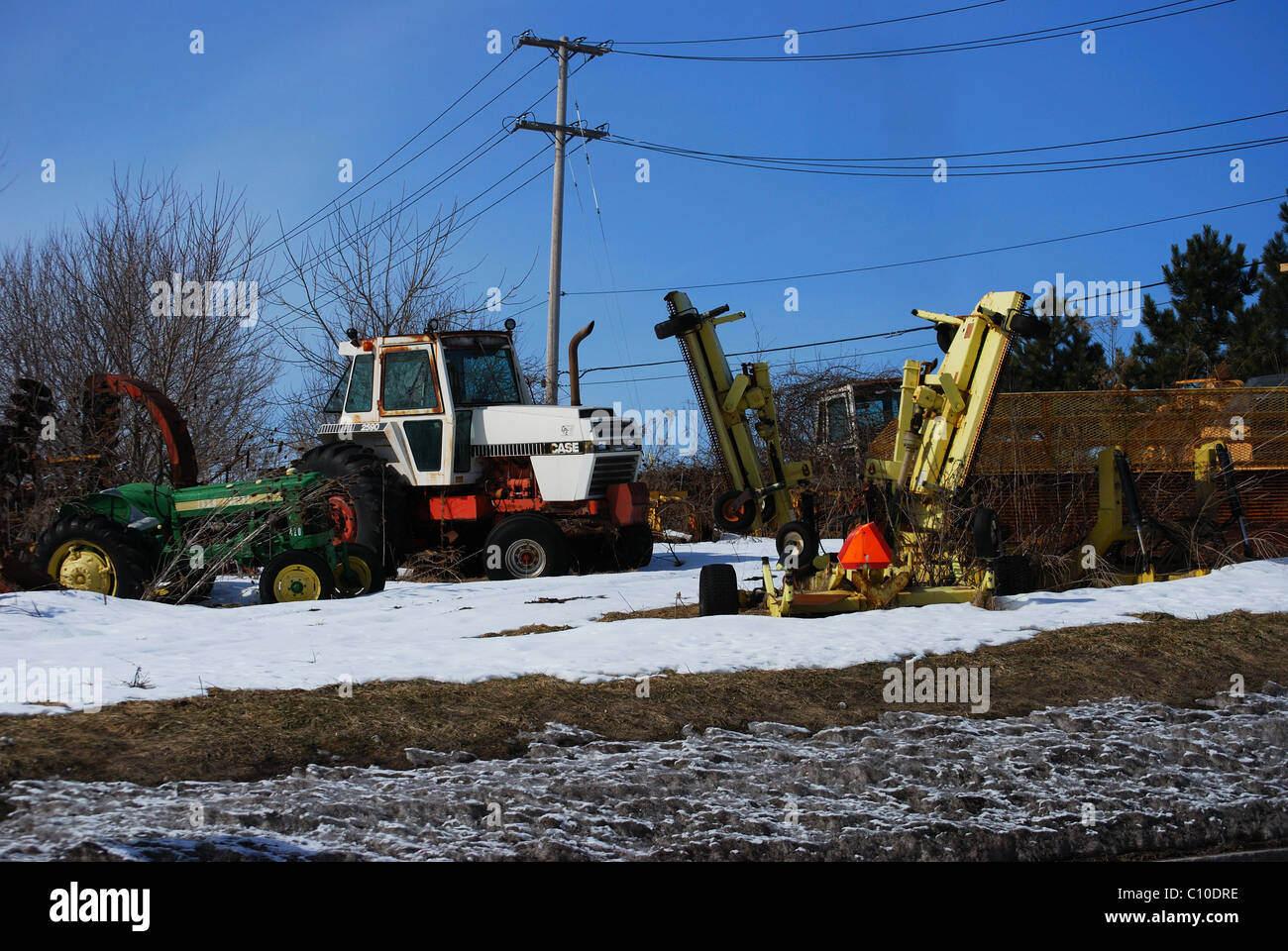 Farmer's old junk farm equipment Stock Photo - Alamy