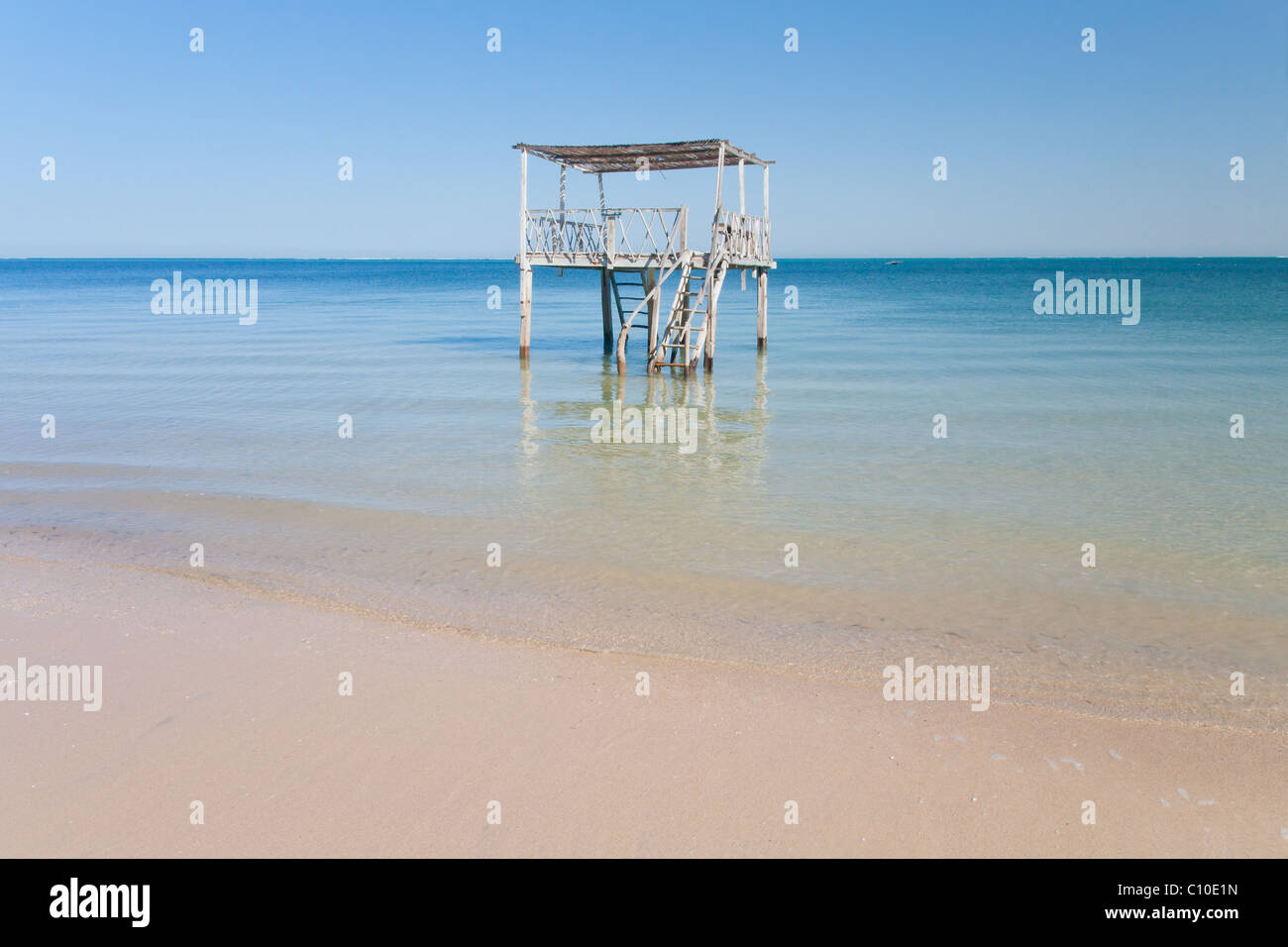 Pontoon in the lagoon with blue sky Stock Photo - Alamy