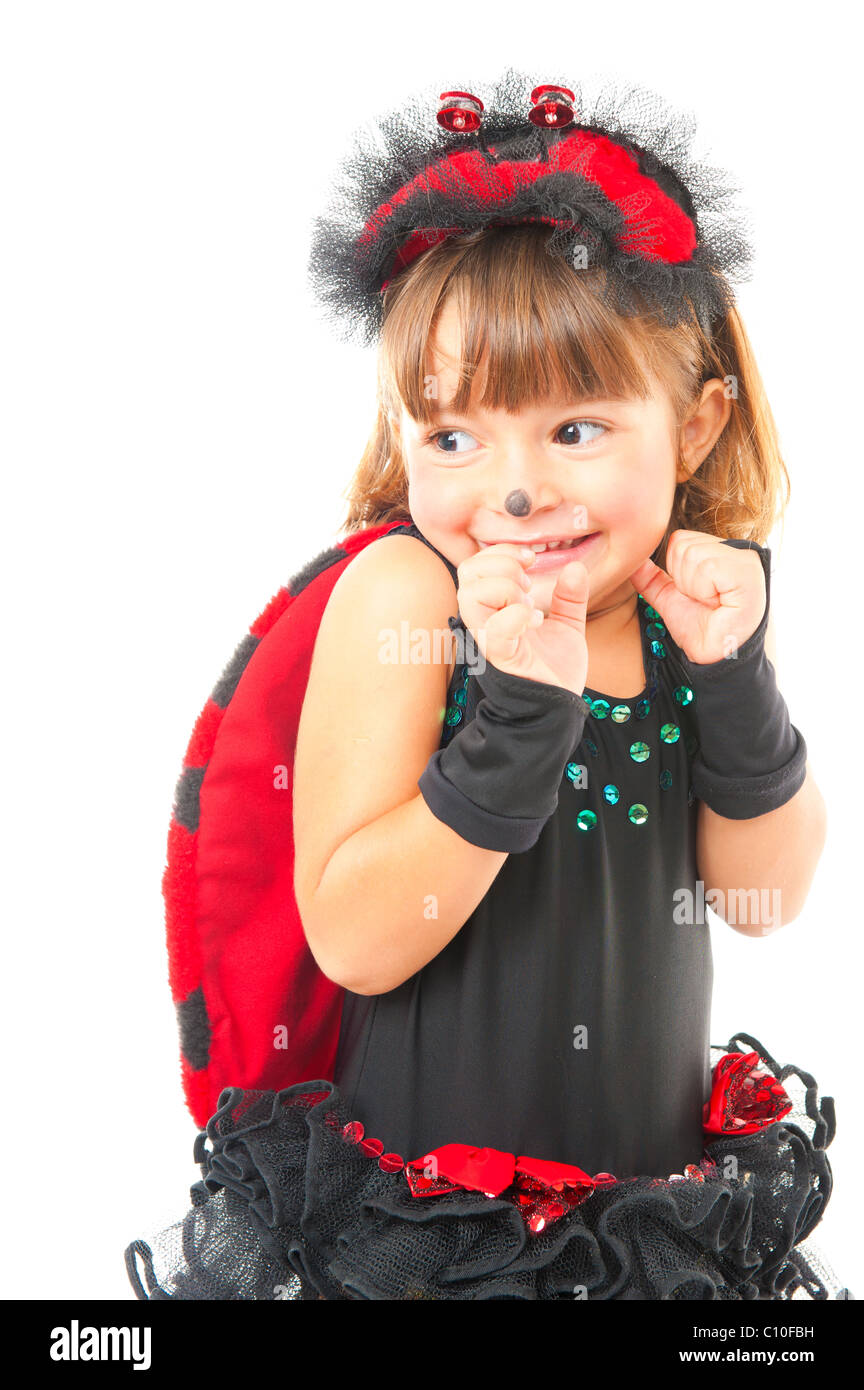 Cute child with Ladybug looking at the side Stock Photo - Alamy