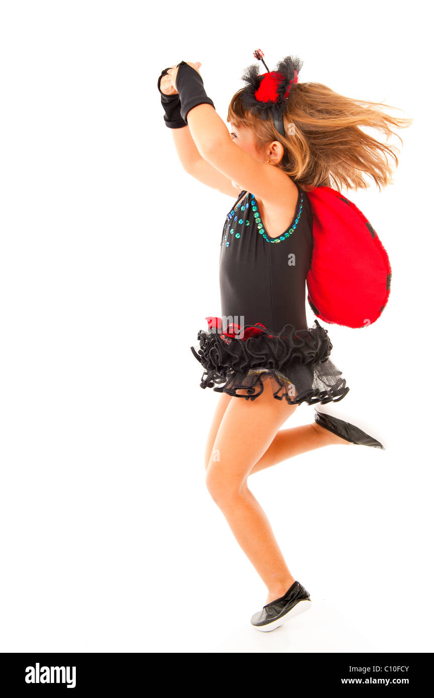Child with Ladybug costume dancing on white background Stock Photo - Alamy
