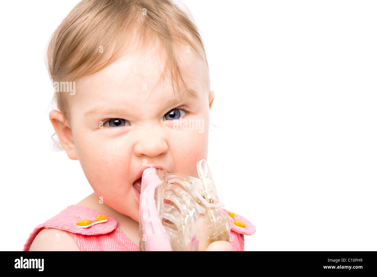 Baby eating own shoe close up isolated on white Stock Photo - Alamy