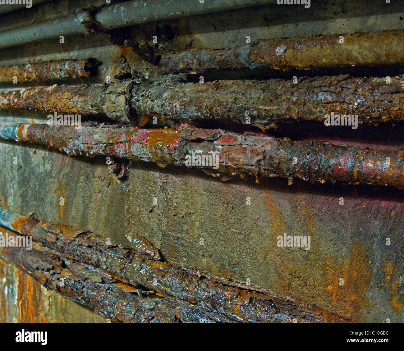 Steel pipes, exposed to dripping water for decades, fall apart Stock ...