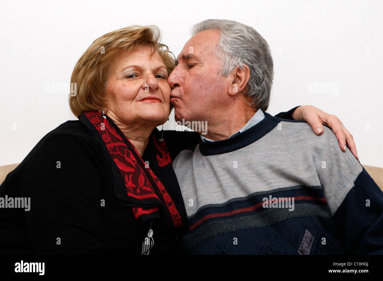 Old couple kiss studio hi-res stock photography and images - Alamy
