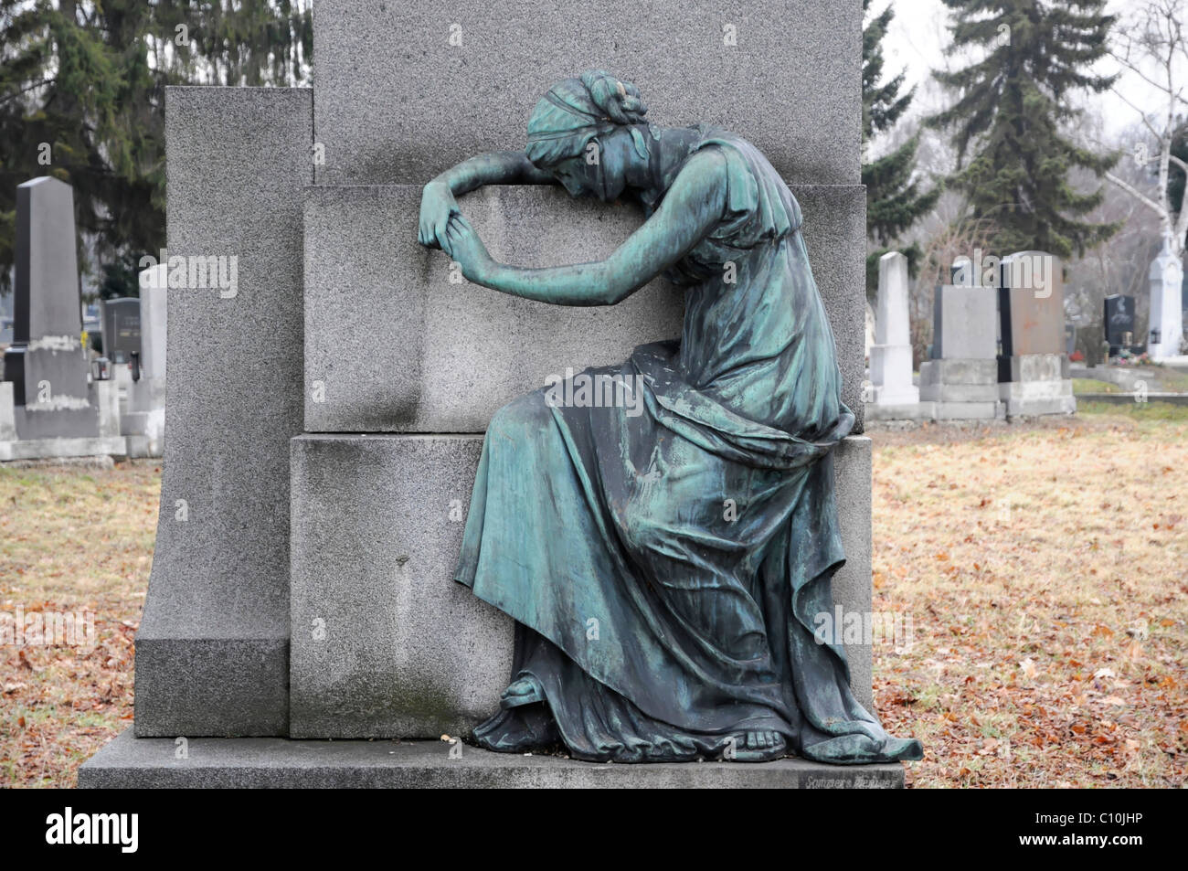 Tombstone, marble statue on a grave at the Central Cemetery, Vienna ...