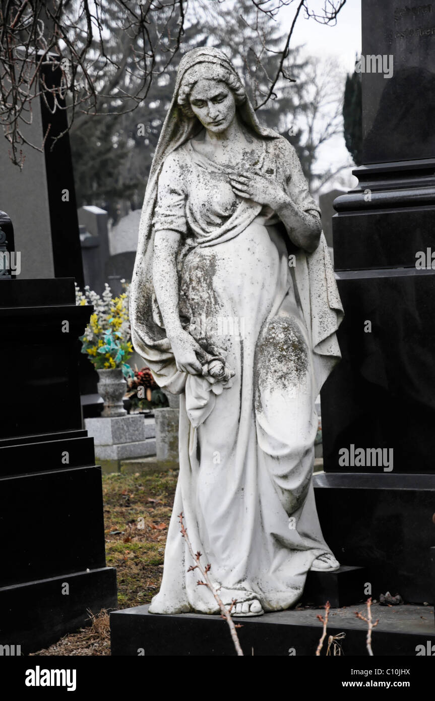 Marble statue on a grave at the Central Cemetery, Vienna, Austria ...