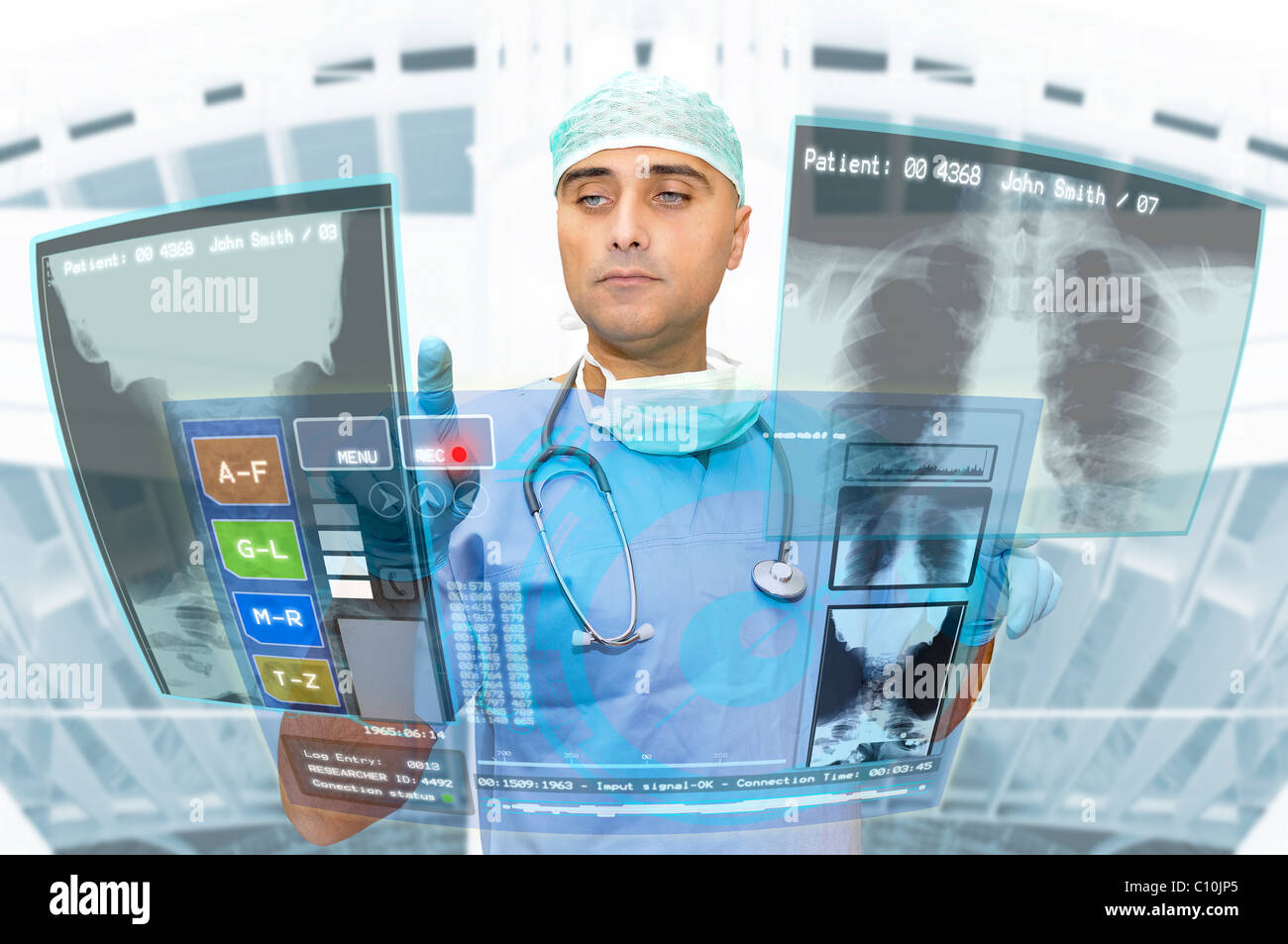 Doctor with high-tech computer screen viewing patient data Stock Photo ...