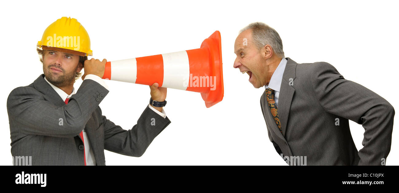 Boss screaming with engineer Stock Photo - Alamy