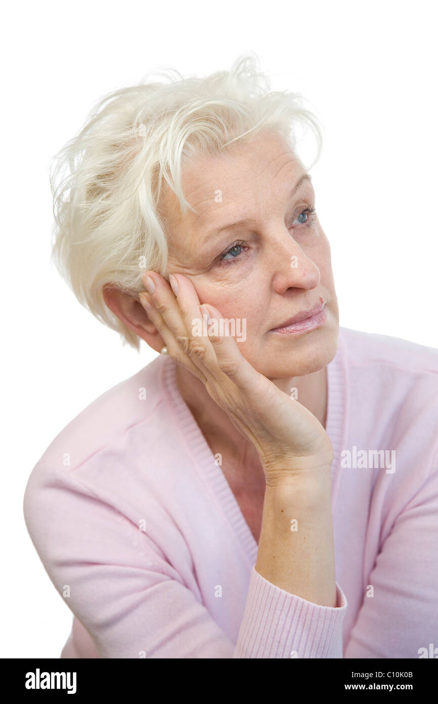 A mature woman looking bored and to the side Stock Photo - Alamy