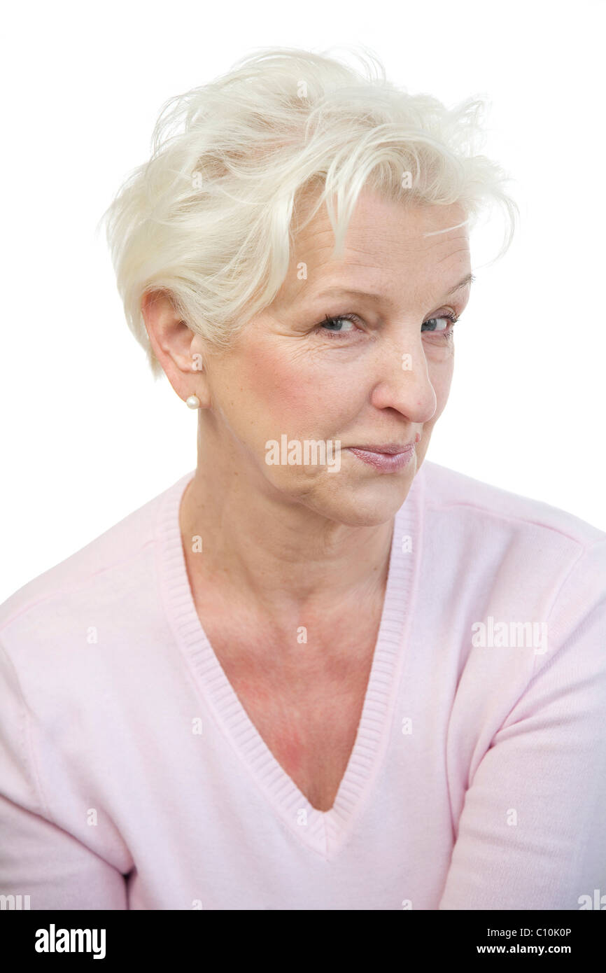 Woman with coy expression hi-res stock photography and images - Alamy
