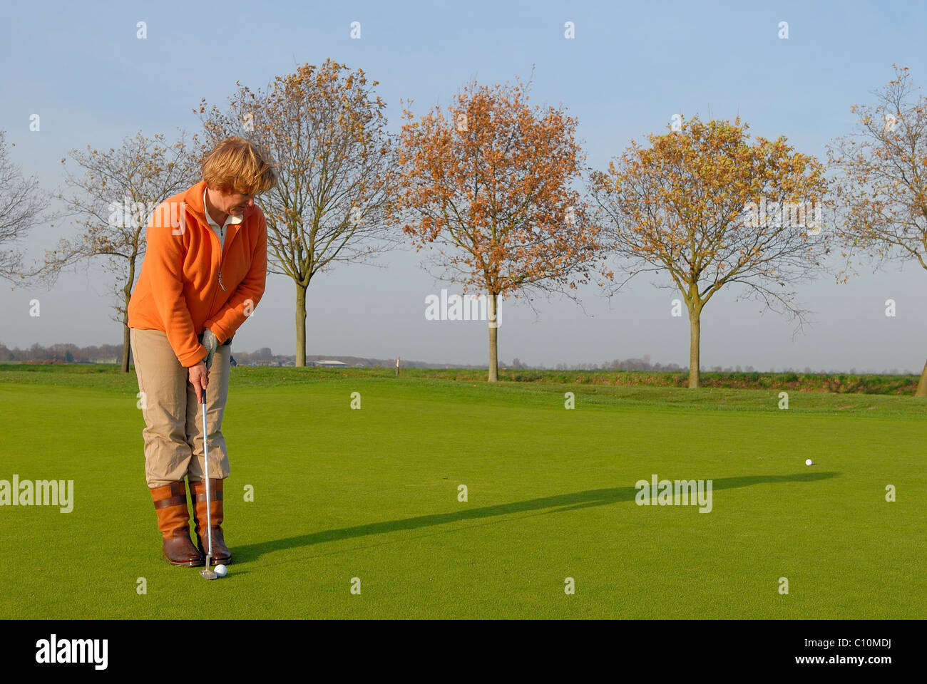 Action golf sports women hi-res stock photography and images - Alamy