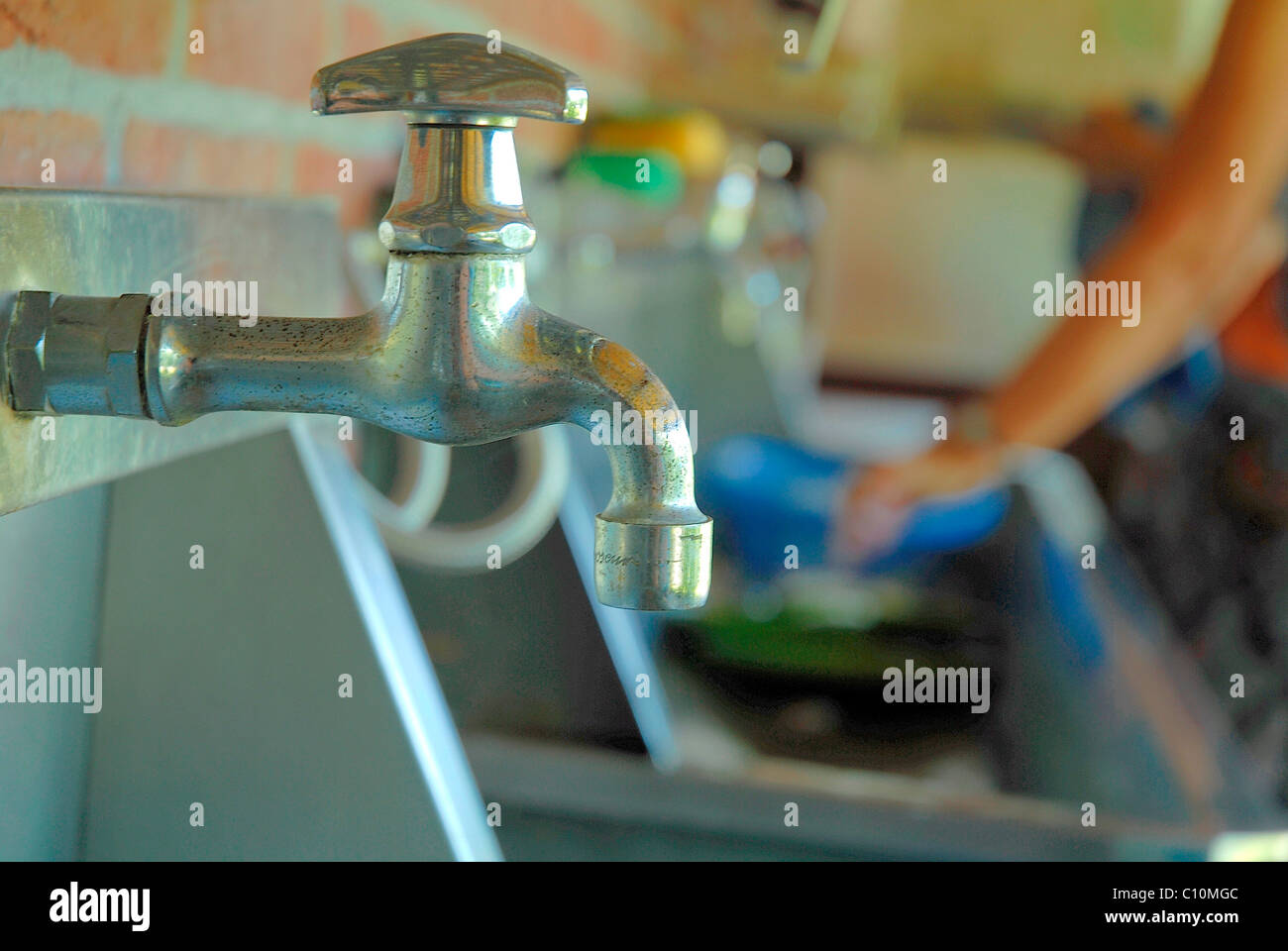 Outdoor communal sink at camping site Stock Photo - Alamy