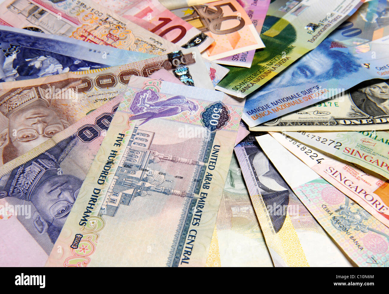 Banknotes in different currencies Stock Photo - Alamy