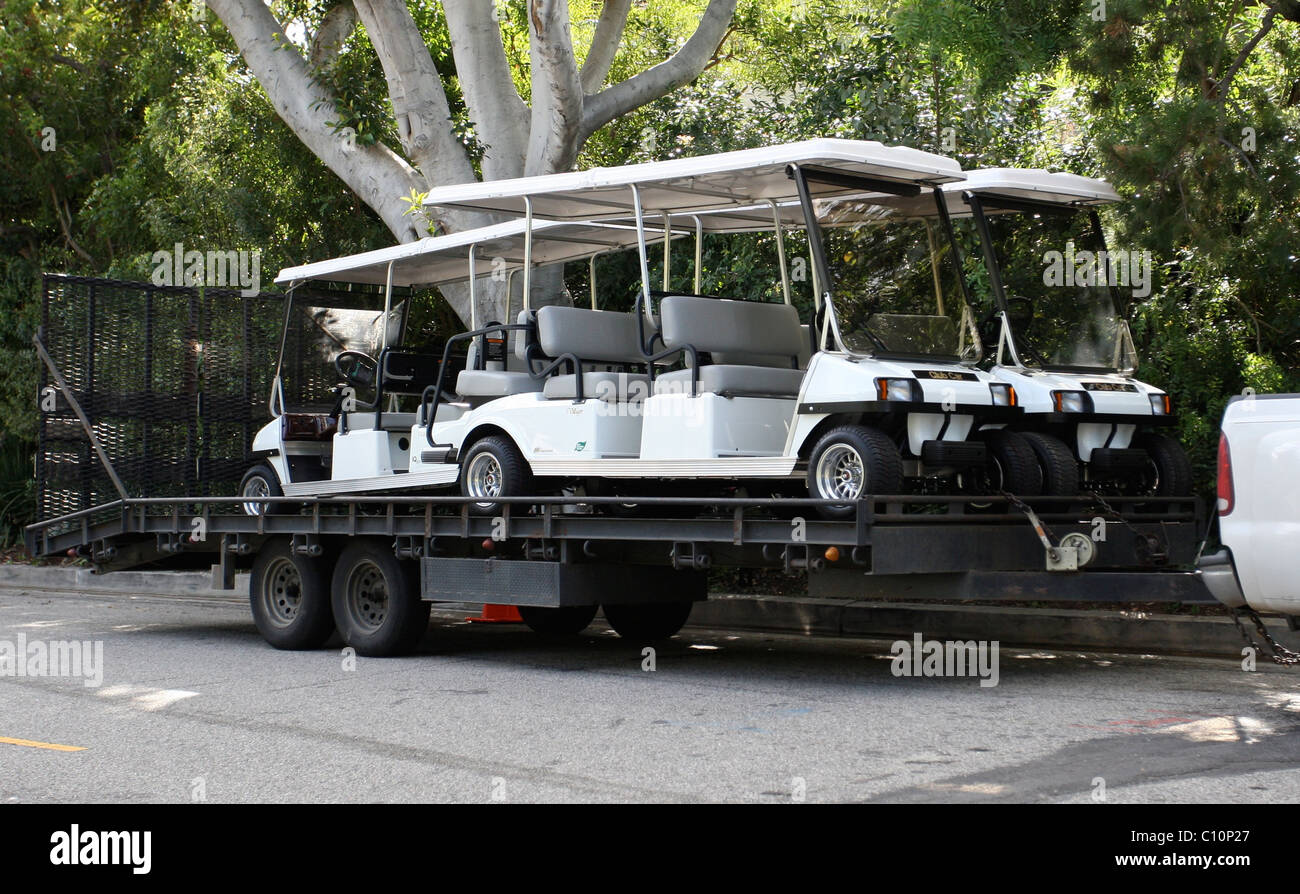 Golf carts being delivered for use by the valet for Jennifer Aniston's ...