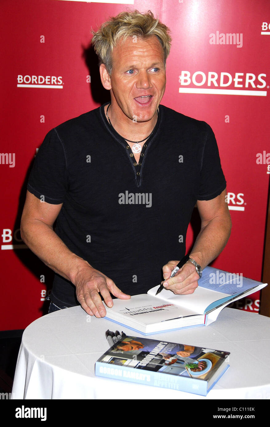 Gordon Ramsay signing his new book 'Gordon Ramsey's Healthy Appetite ...