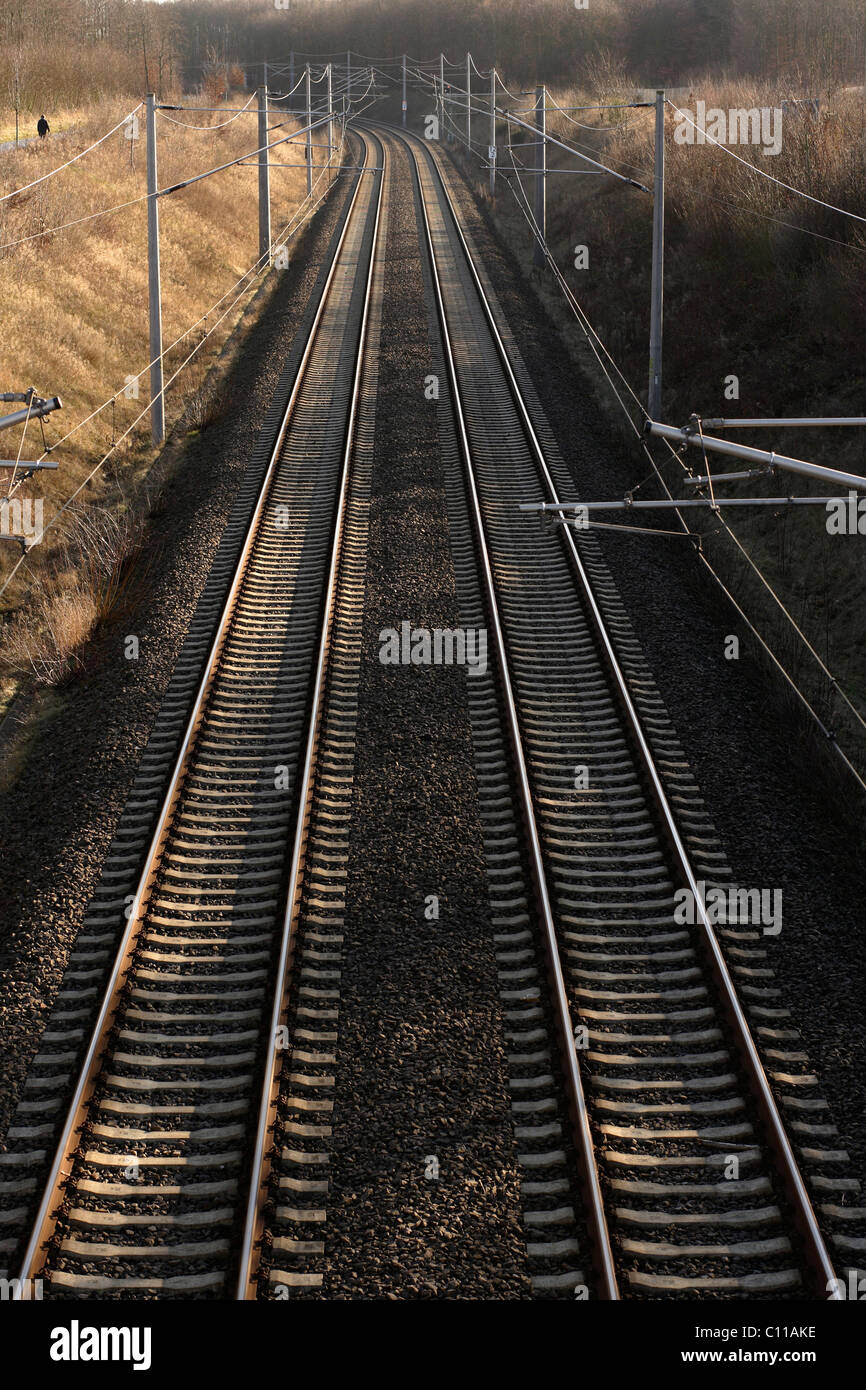 Railroad tracks with tracks and overhead contact line, from above ...