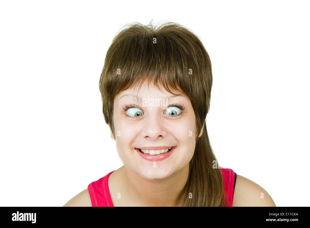 Girl with insane eyes on the isolated background Stock Photo - Alamy
